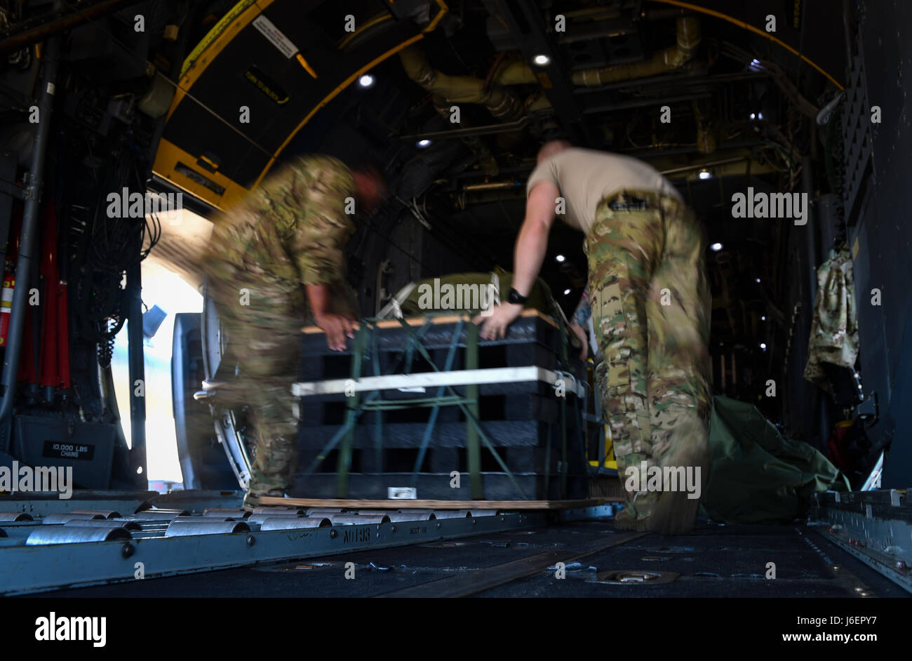 Loadmasters with the 15th Special Operations Squadron transport a ...