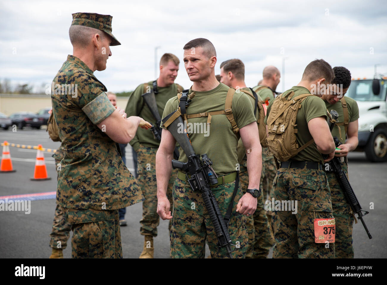 U.S. Marine Training Command personnel observe Marines from The Basic ...