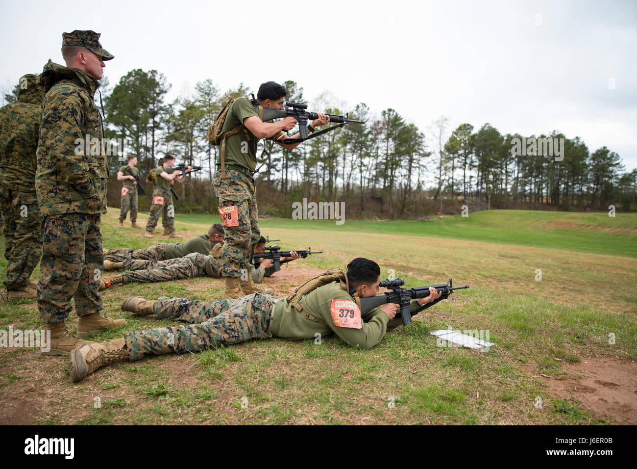 U.S. Marines with The Basic School (TBS) fire M16A4 rifles during the ...