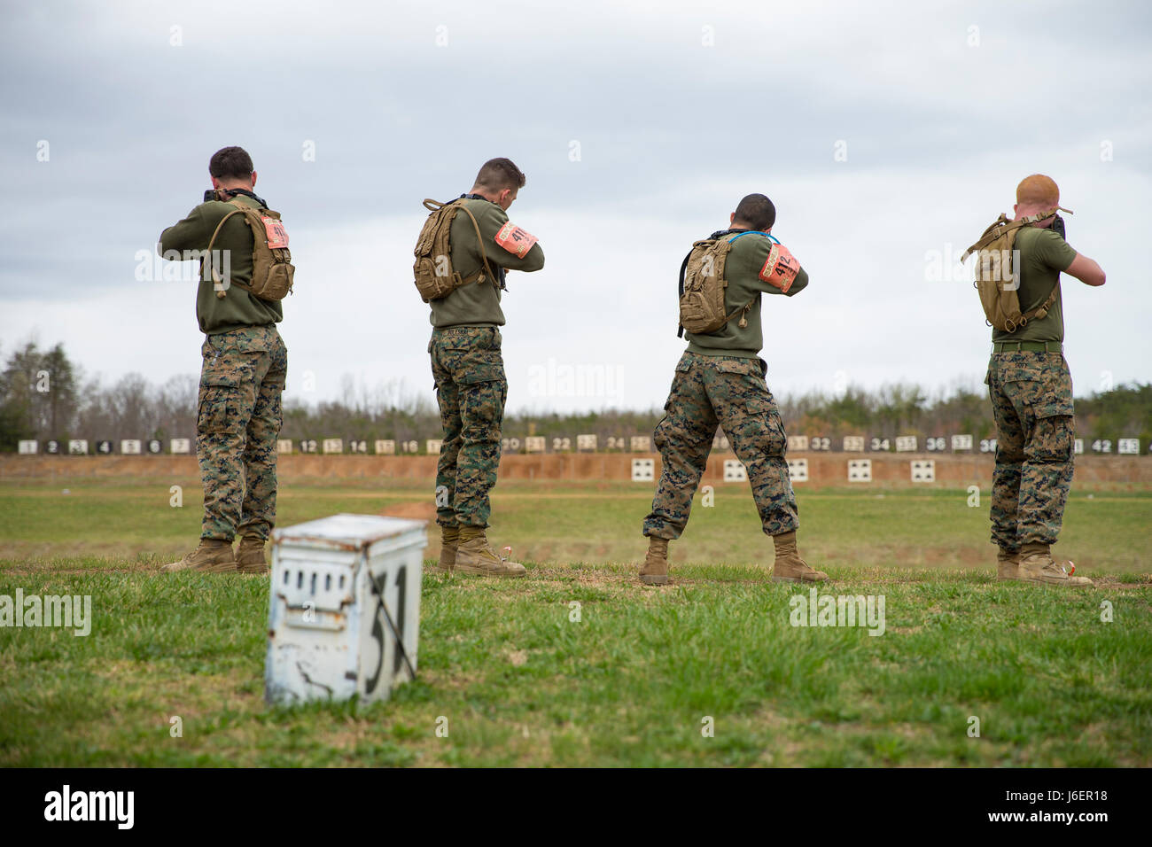 U.S. Marines with The Basic School (TBS) fire M16A4 rifles from the ...