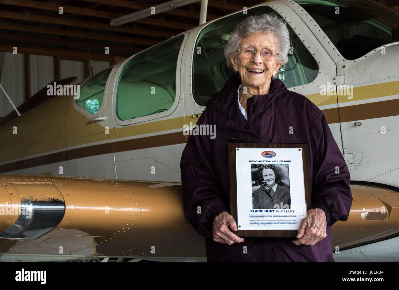 Elaine McCalley poses for a photo in front of an aircraft April 10 ...
