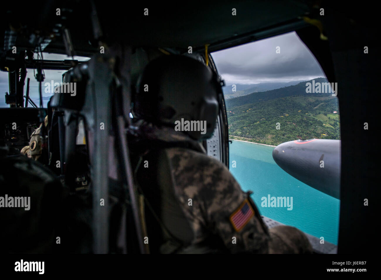 U.S. Army SPC. Kevin Breedlove a crew chief provides safety checks to ...