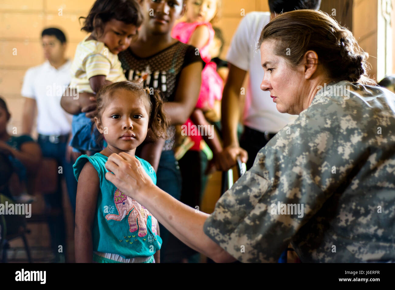 U.S. Army LTC. Rhonda Dyer provides deworming and preventative ...