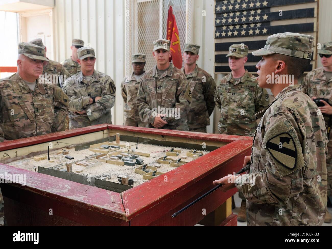 A soldier from Charlie Company, 1-12 Cavalry, briefs senior leaders on ...