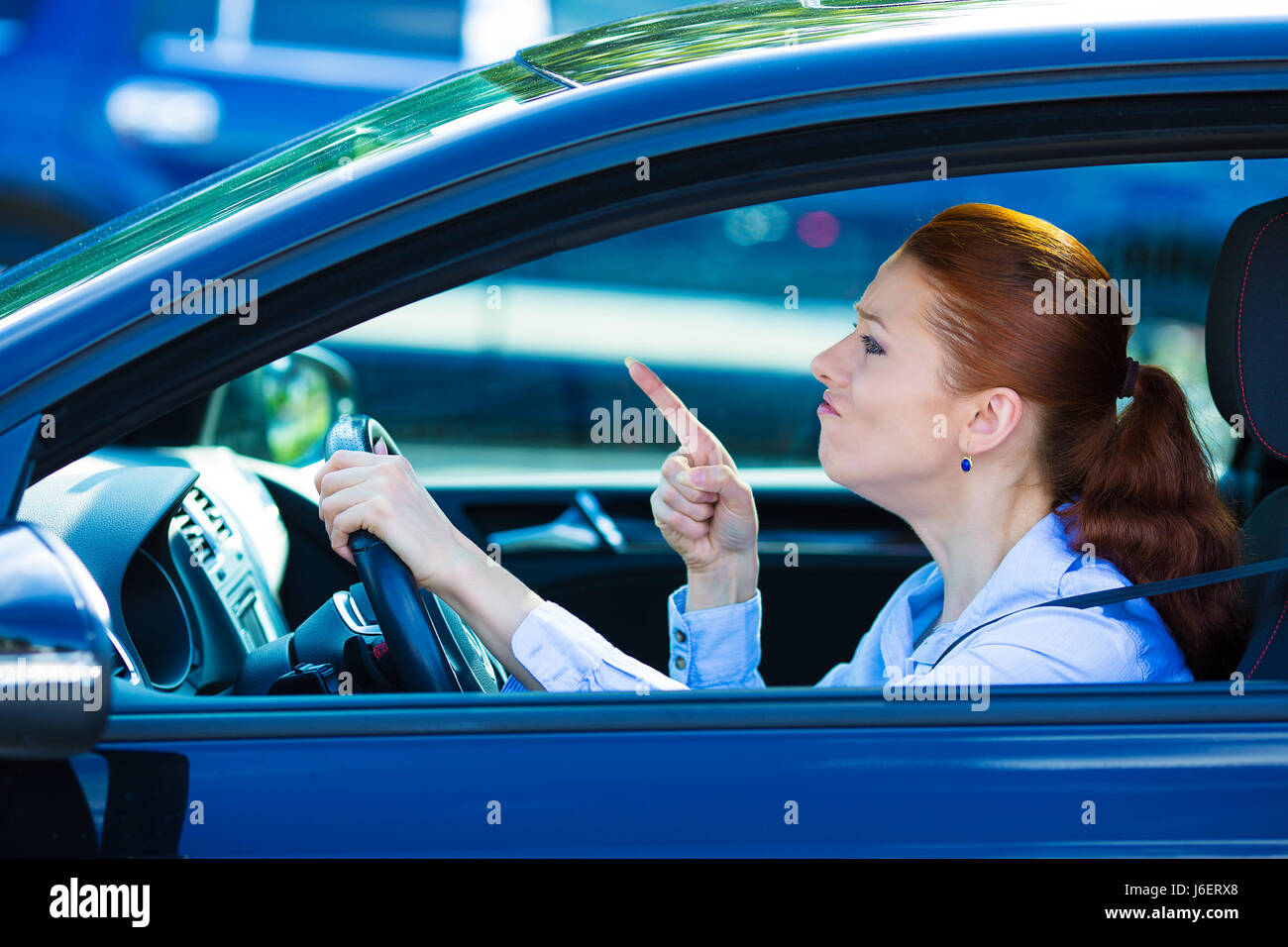 Closeup portrait displeased angry pissed off aggressive woman driving ...