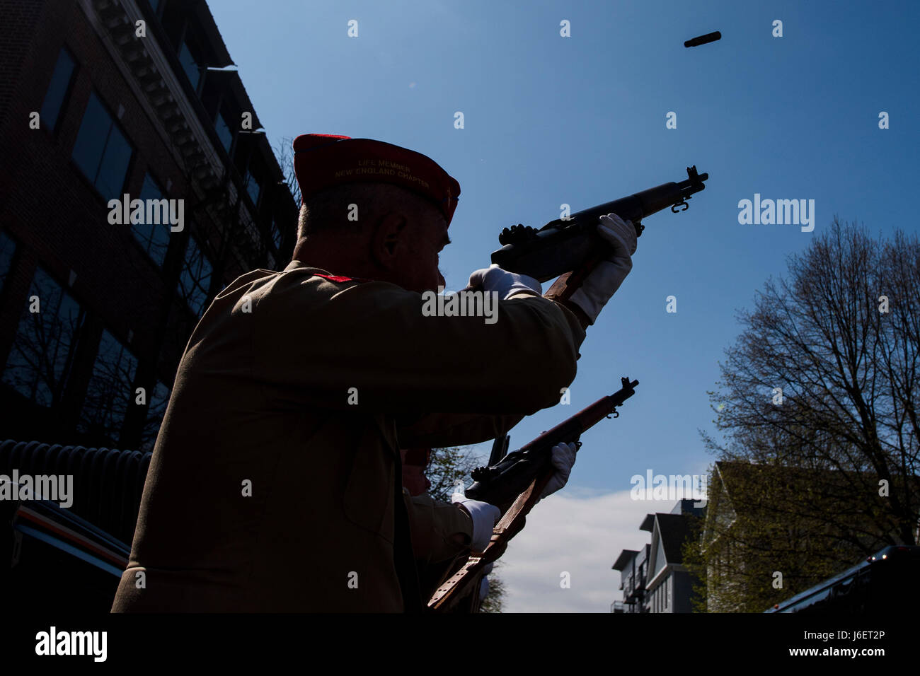 A rifle party performs a three-volley salute during the 30th Annual ...