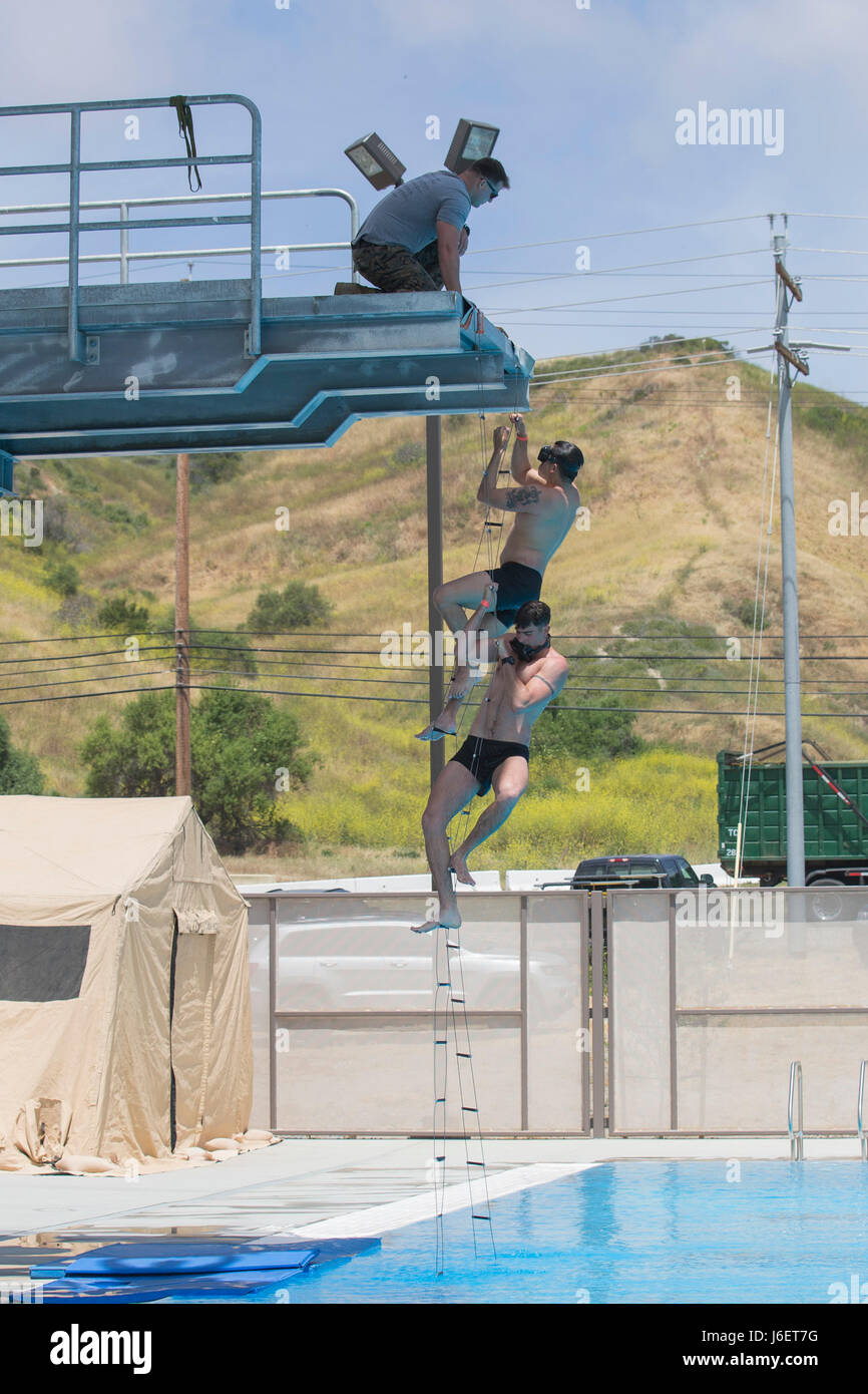 U.S. Marine Corps Reconnaissance Challenge competitor Cpl. Senteno, top ...