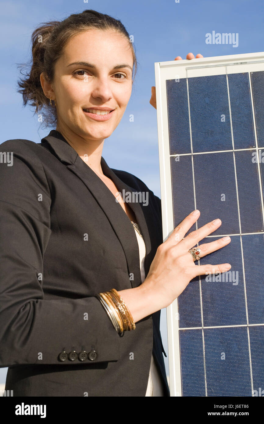 woman holding a solar module Stock Photo - Alamy
