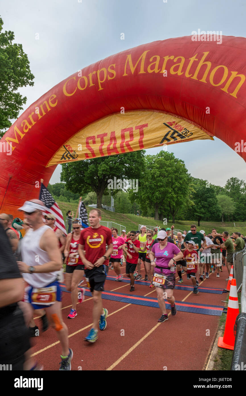 Runners take off to start the Centennial Quantico 100, held at Butler ...