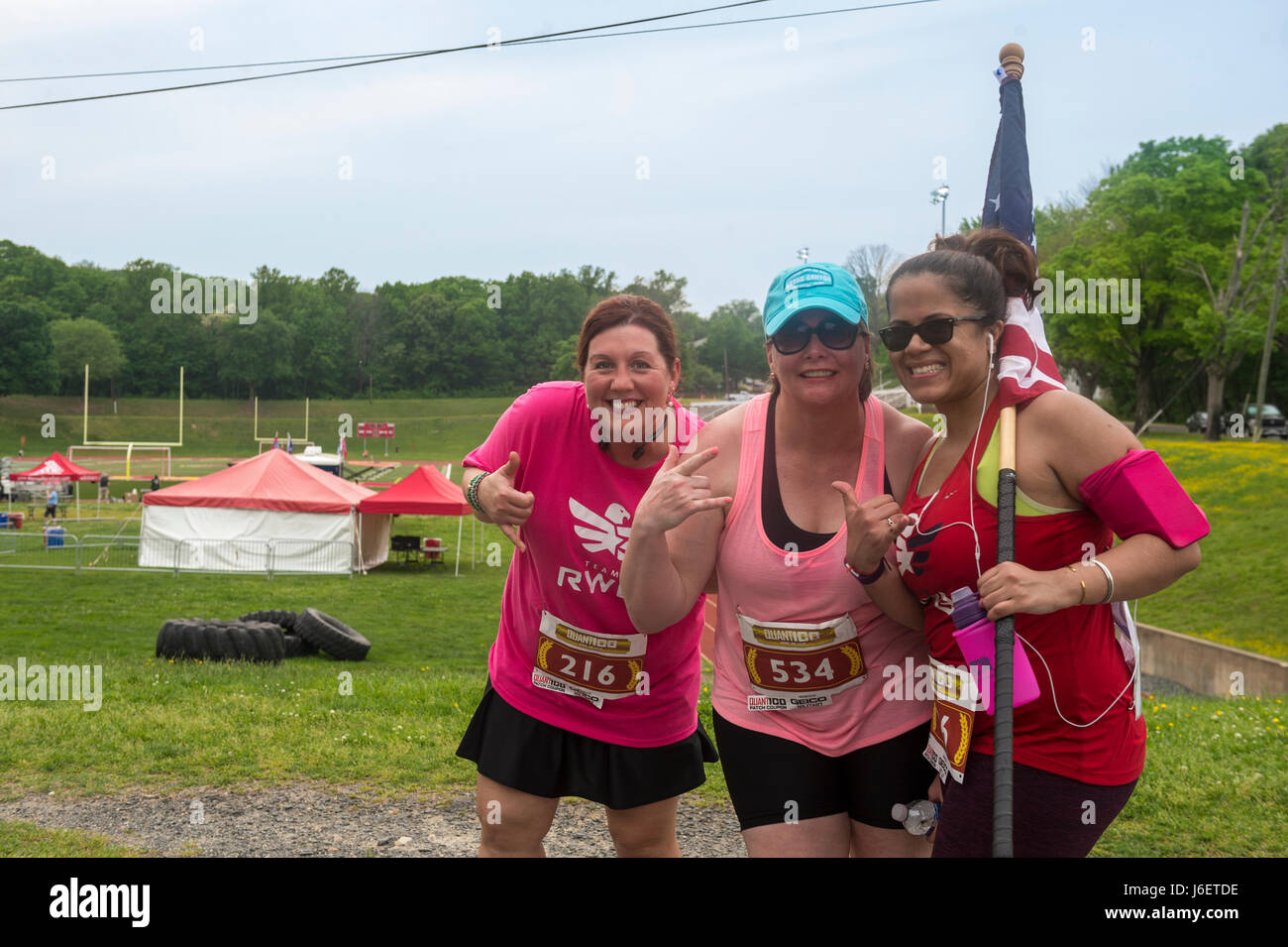 Participants pose for a photo during the Centennial Quantico 100, held ...
