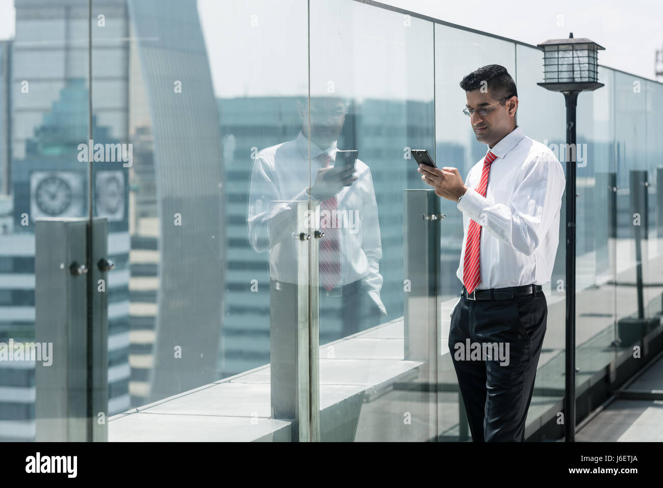 Indian business man mobile hi-res stock photography and images - Alamy