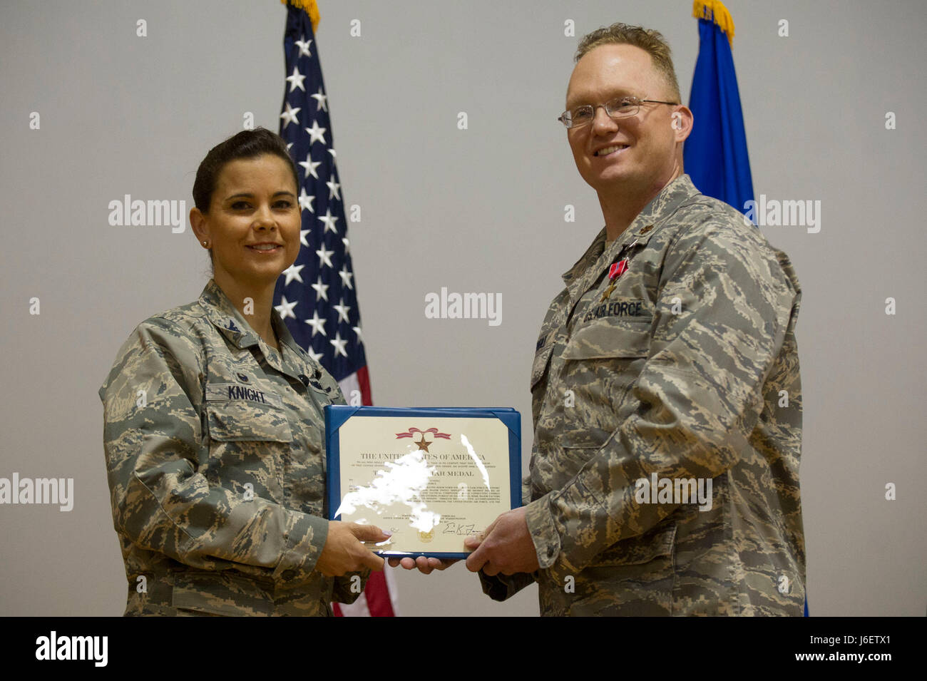 Col. Leslie Knight, 779th Medical Group Commander, presents a Bronze ...