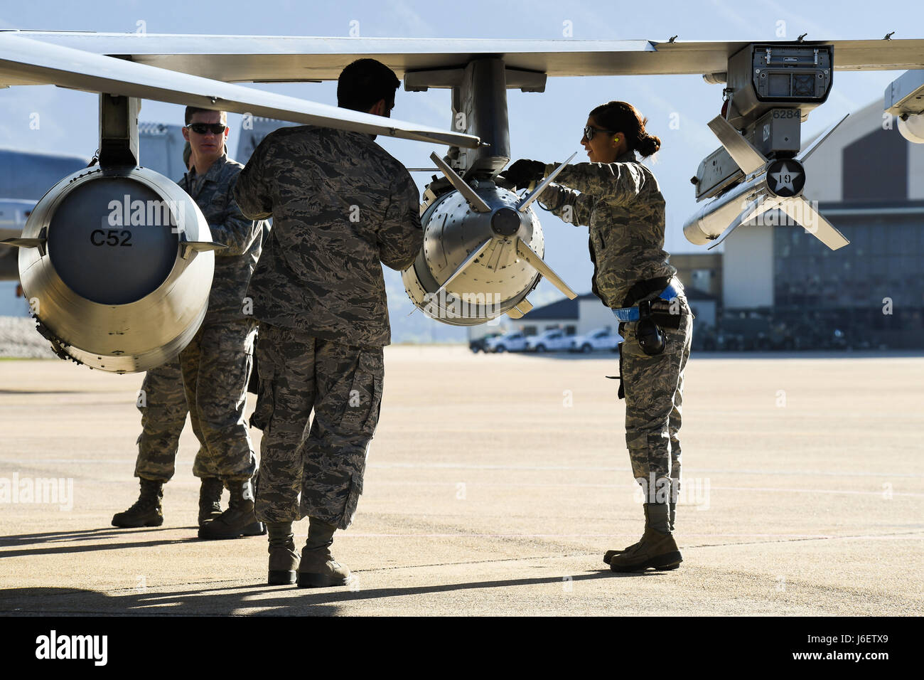 Weapons Airmen assigned to the 136th Maintenance Squadron, Naval Air ...