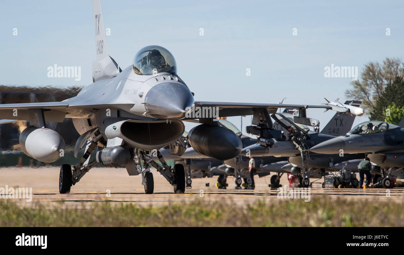 An F-16 Fighting Falcon aircraft from Naval Air Station Fort Worth ...