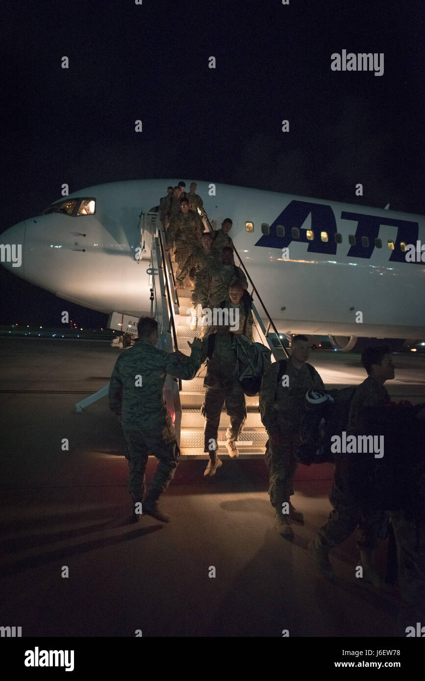 Senior Airman Nathan Eckert, 36th Wing Public Affairs, left, welcomes ...