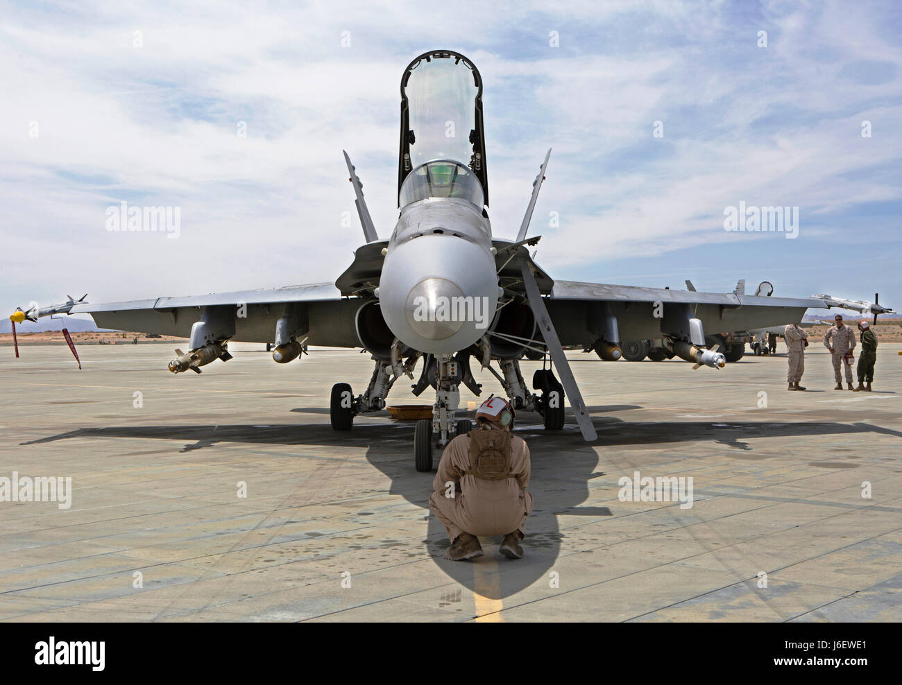 A Marine Fighter Attack Squadron (VMFA) 314 F/A-18C Hornet rests on the ...