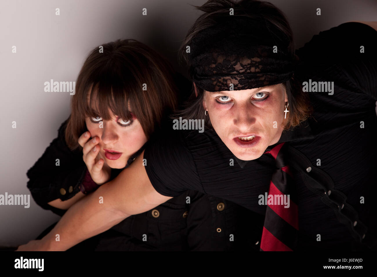 woman fear horror anxious afraid terror couple pair two man woman ...