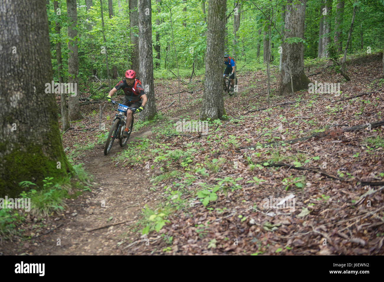 Participants cycle during the Centennial Epic Mountain Bike Ride ...