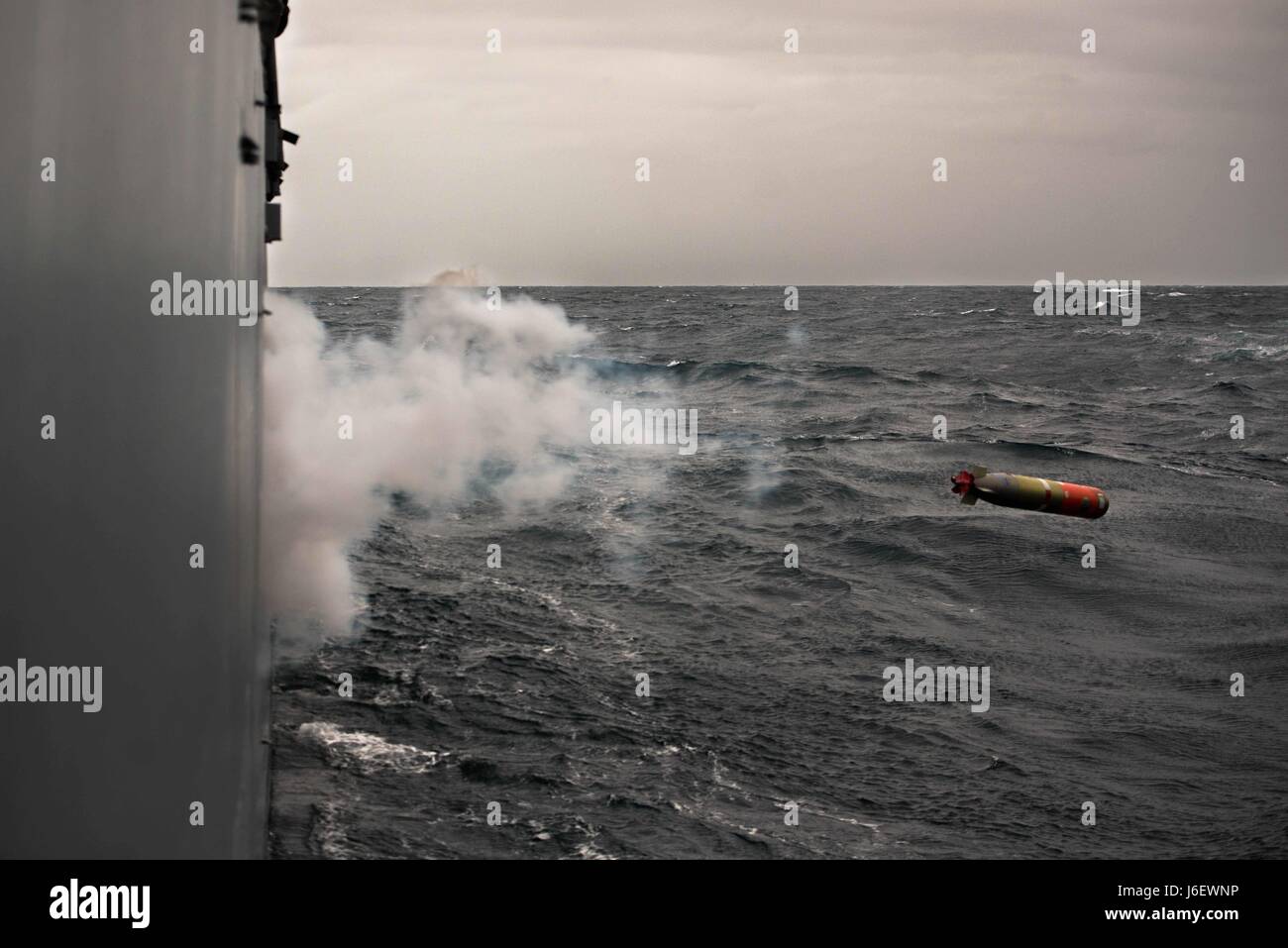 A torpedo is launched from USS Bunker Hill during Group Sail, a pre ...