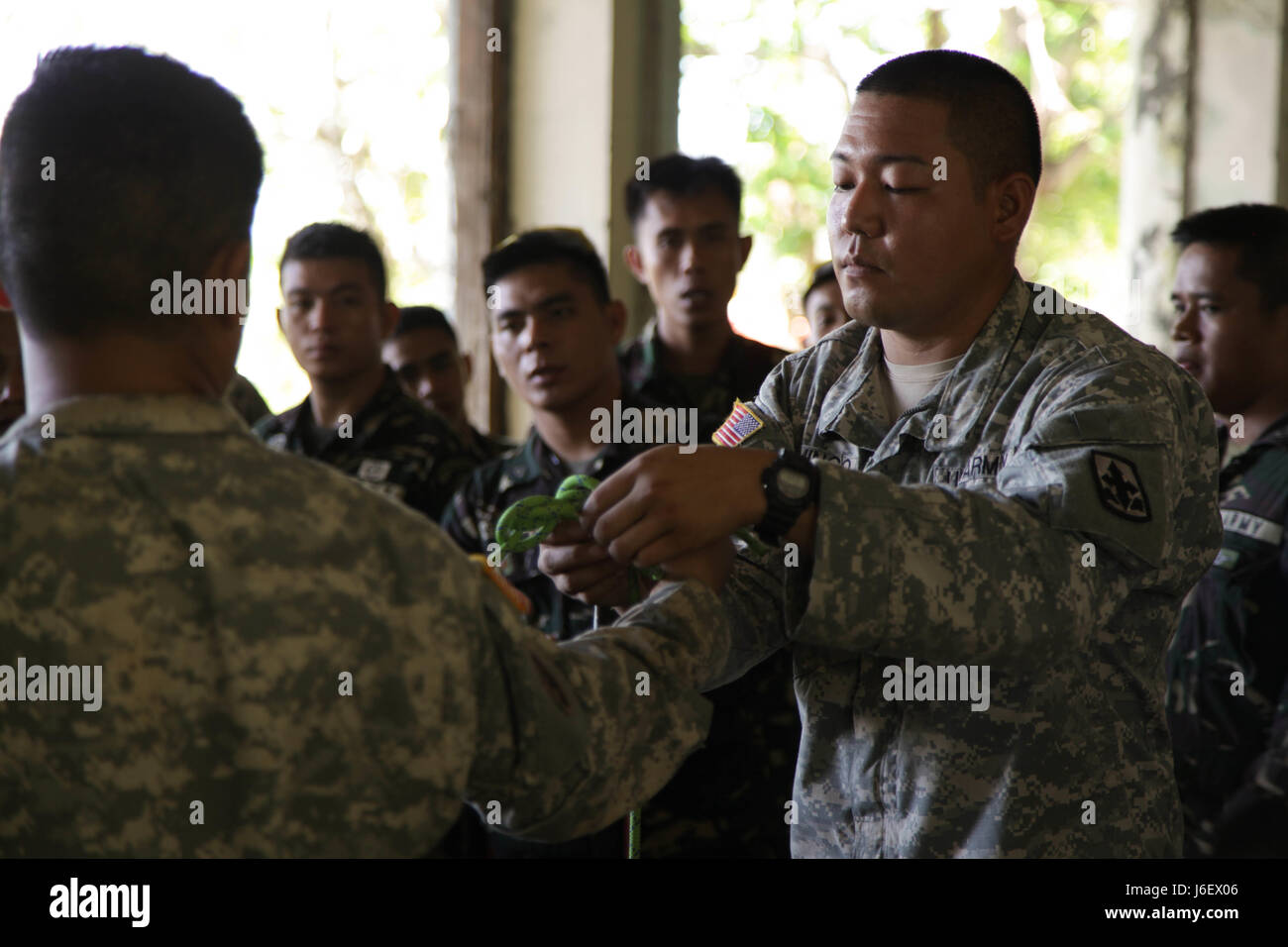 U.S. Army Staff Sgt. Jason Domingo, Hawaii National Guard, demonstrates ...