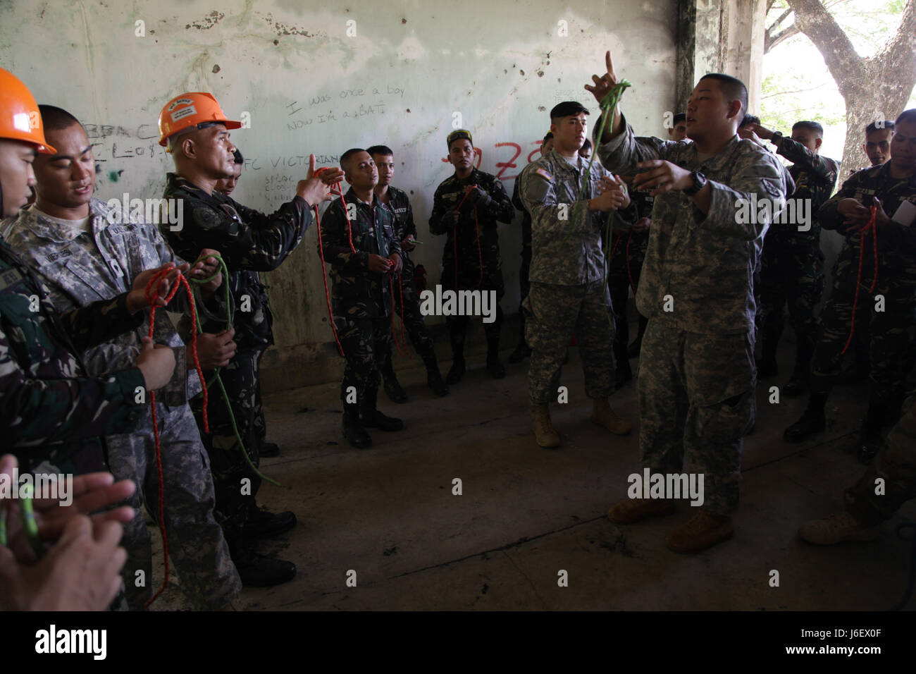 U.S. Army Staff Sgt. Jason Domingo, Hawaii National Guard, demonstrates ...