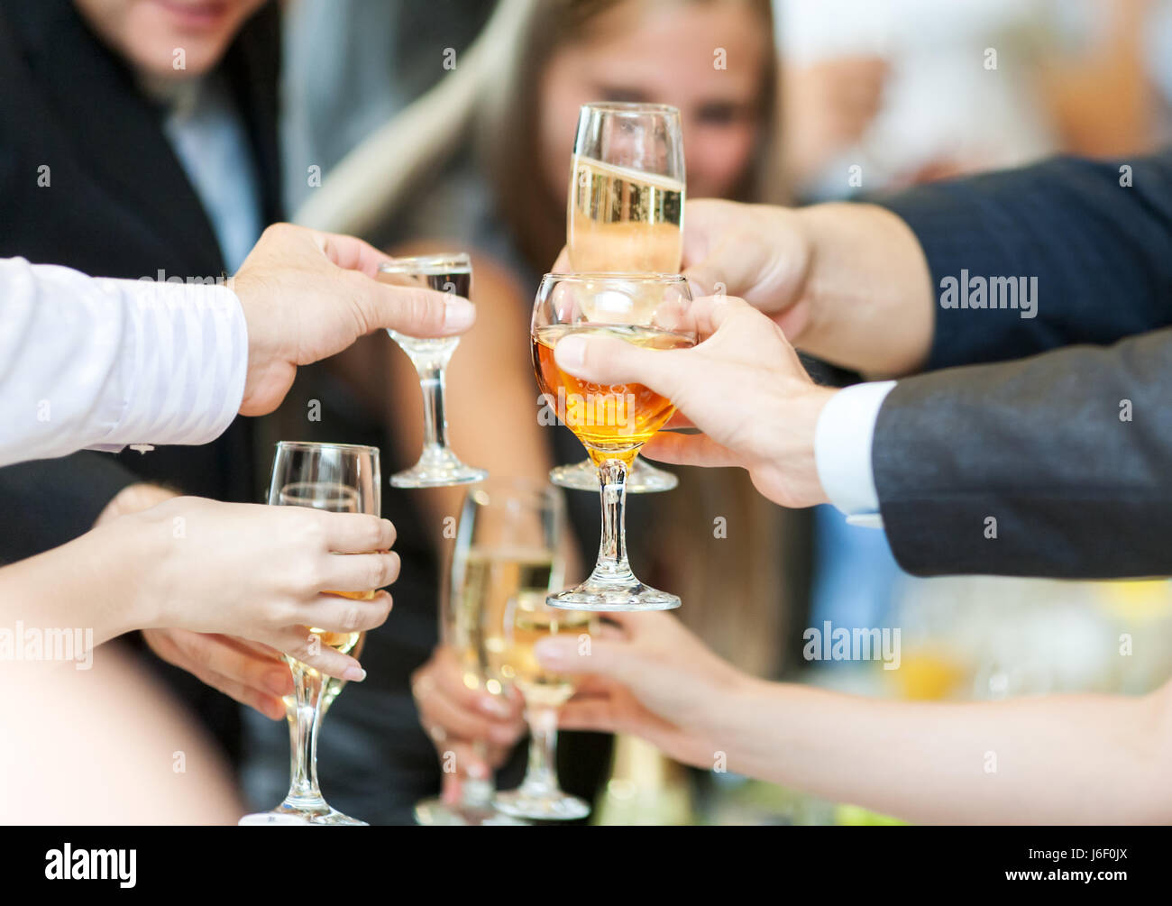Friends cheering dinner party hi-res stock photography and images - Alamy