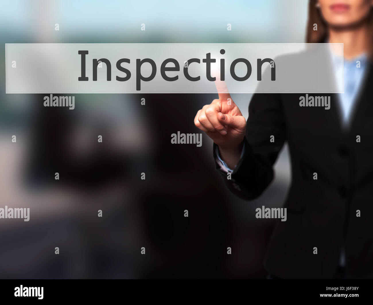 Inspection - Businesswoman hand pressing button on touch screen ...