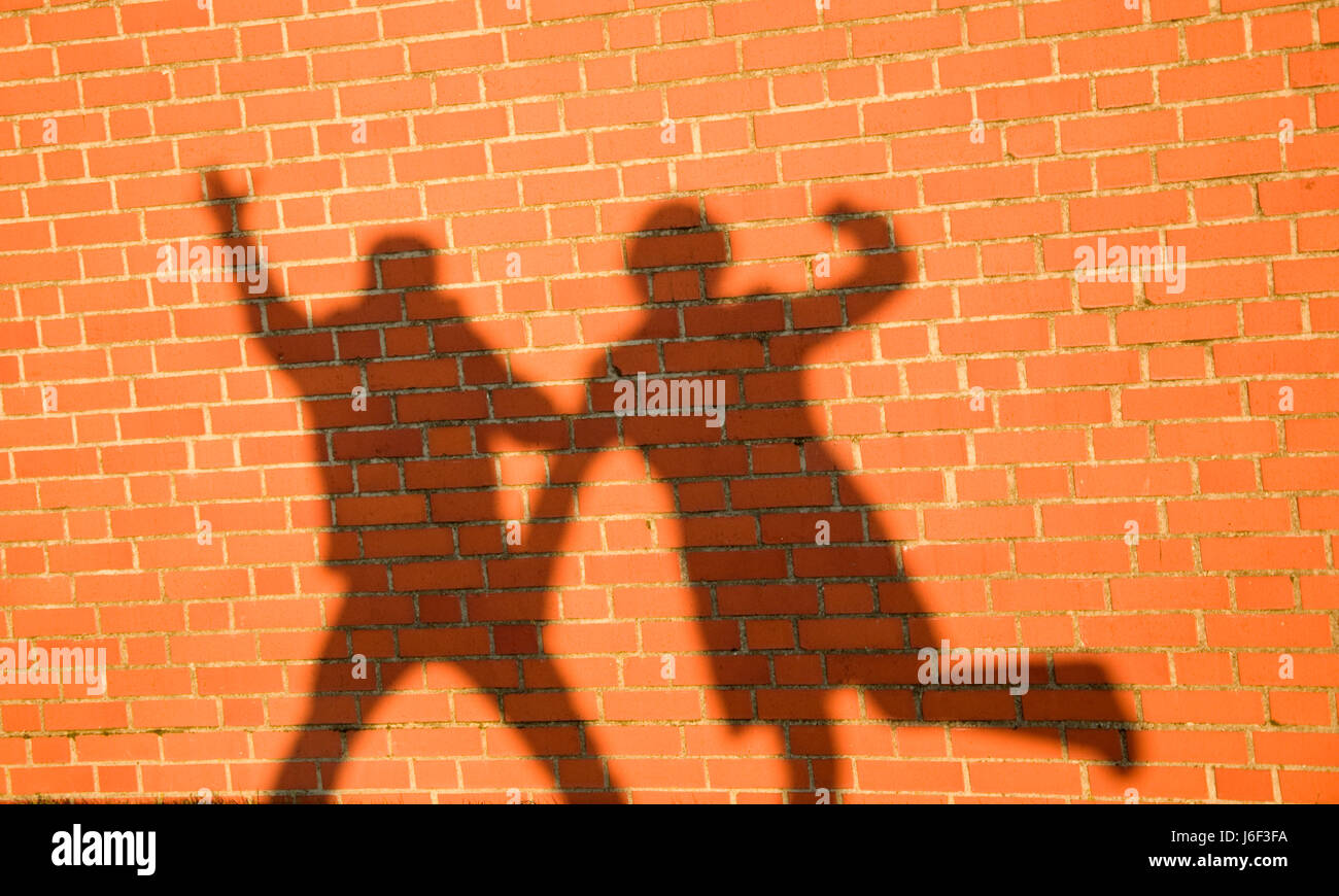 wall physiques shadow play appearance couple pair shaddow shadow two ...
