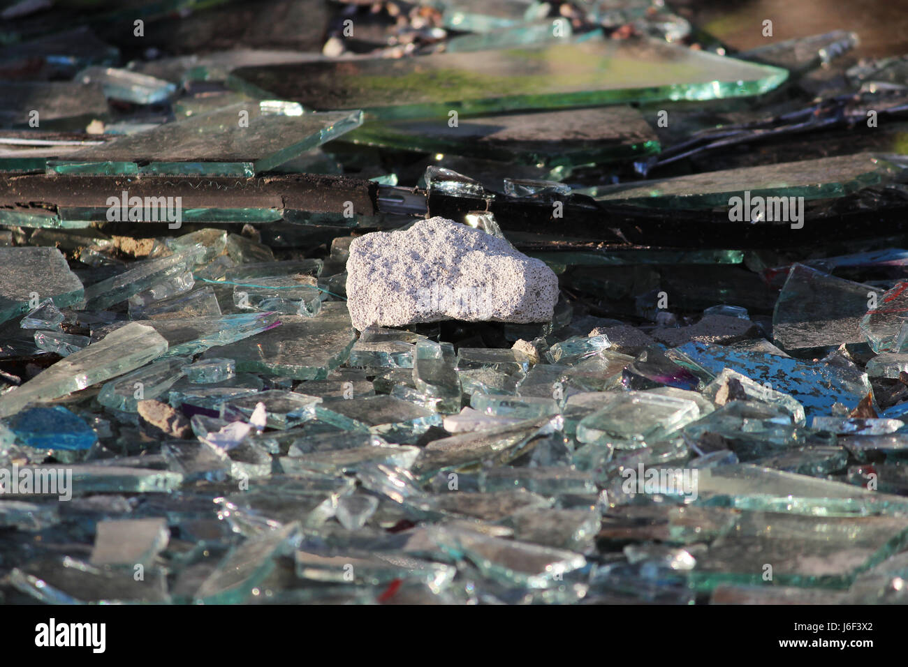 Vandals smashed the glass windows of the unfinished unguarded abandoned ...