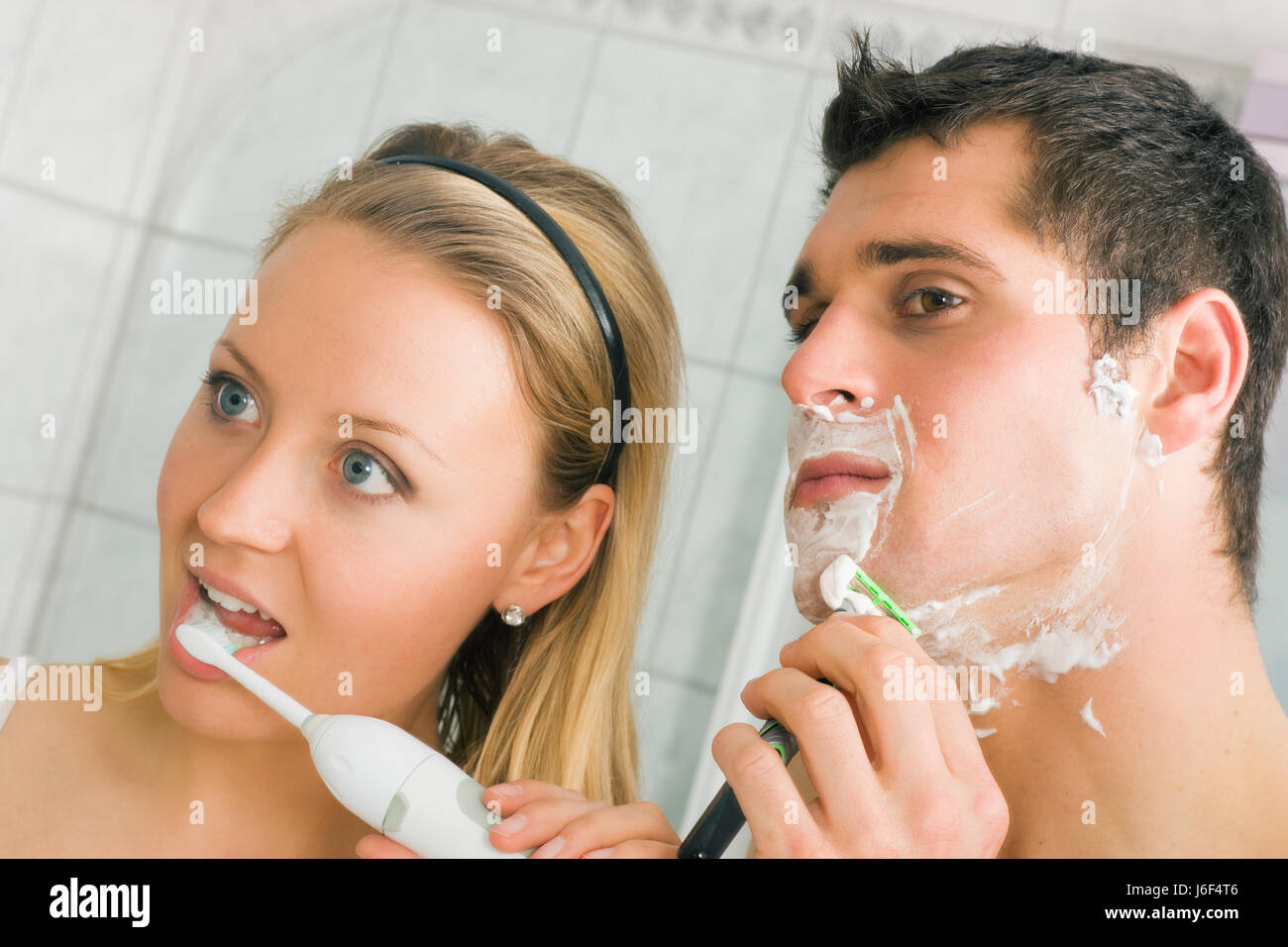 shaving and brushing teeth Stock Photo - Alamy