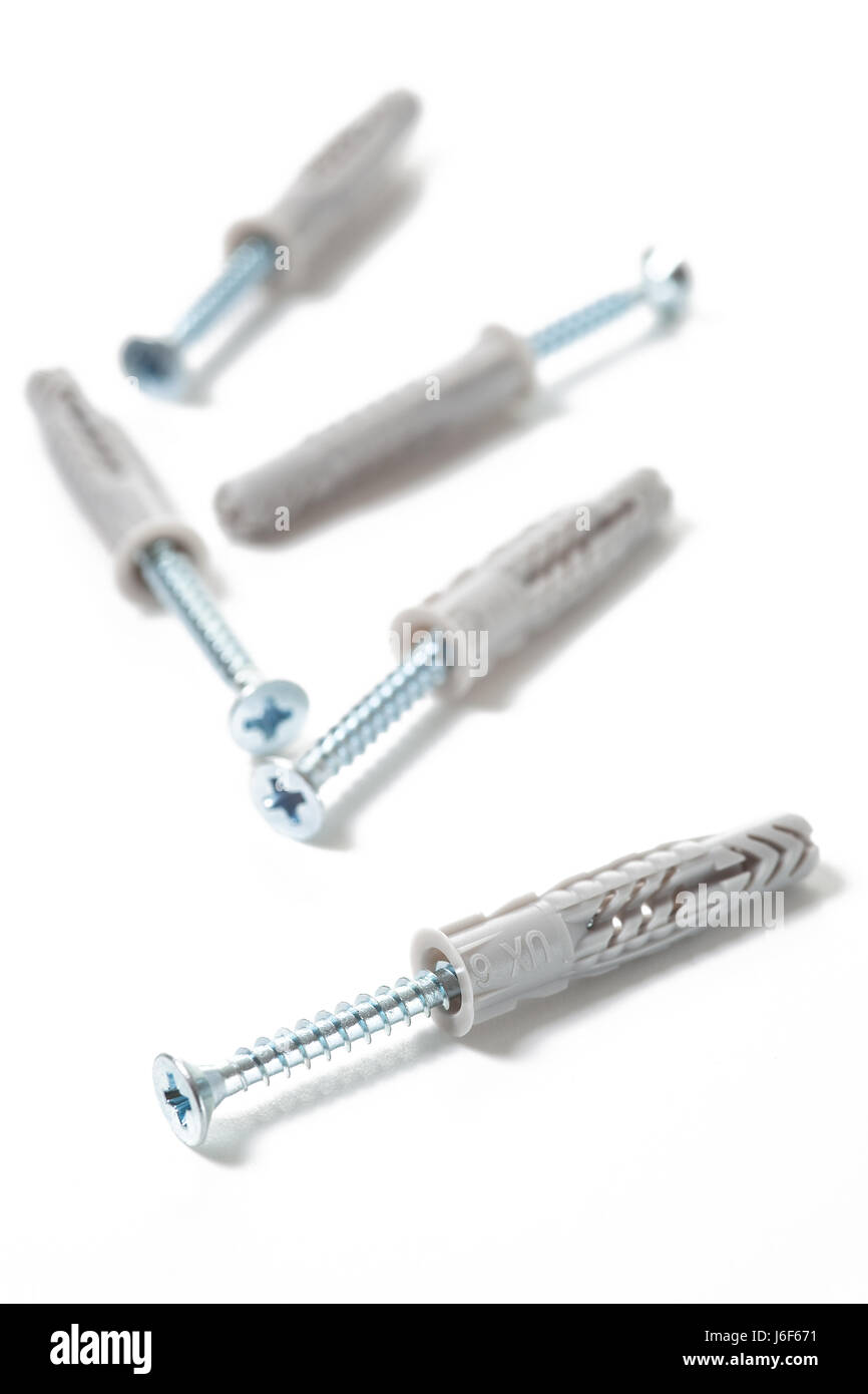 tool wall screw repair plastic synthetic material dowel grey gray close ...