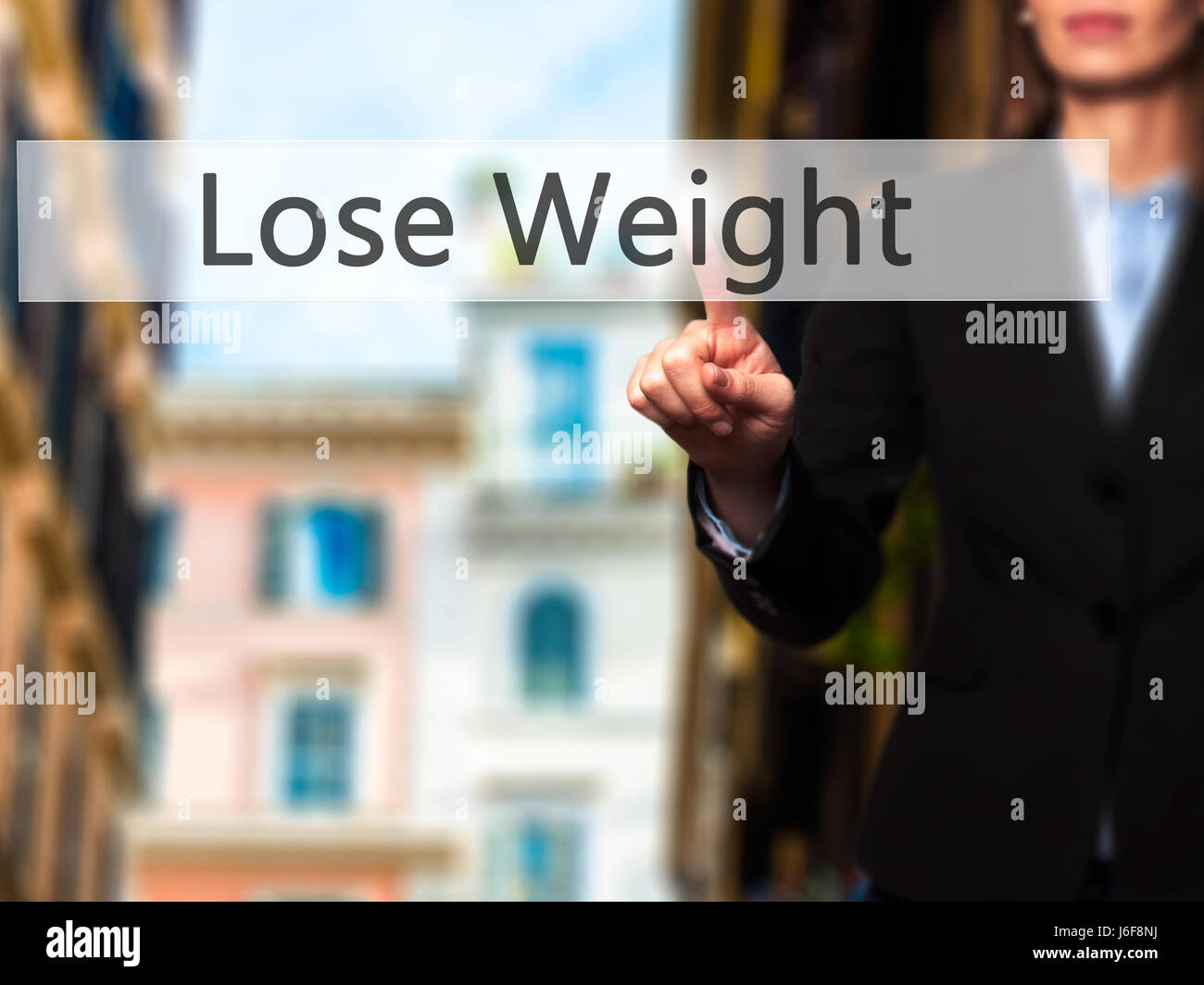 Lose Weight - Businesswoman hand pressing button on touch screen ...