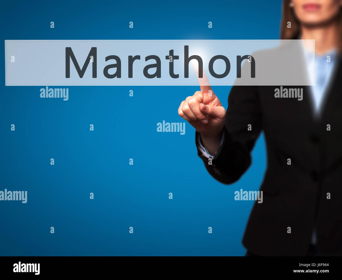 Marathon - Businesswoman hand pressing button on touch screen interface ...