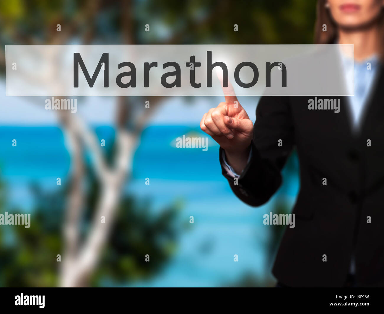 Marathon - Businesswoman hand pressing button on touch screen interface ...