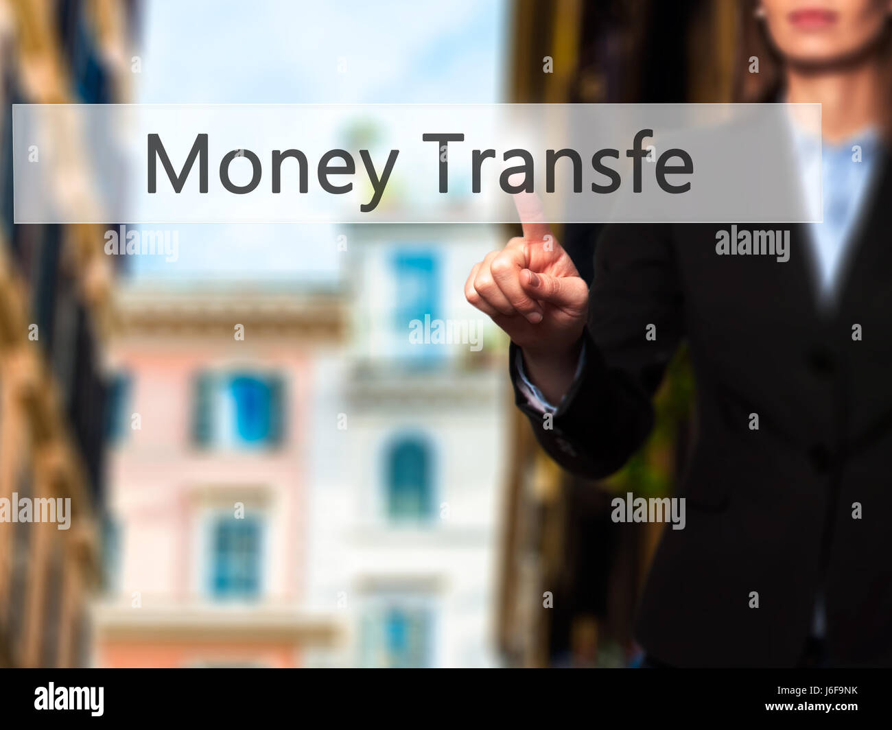 Money Transfer - Businesswoman pressing modern buttons on a virtual ...