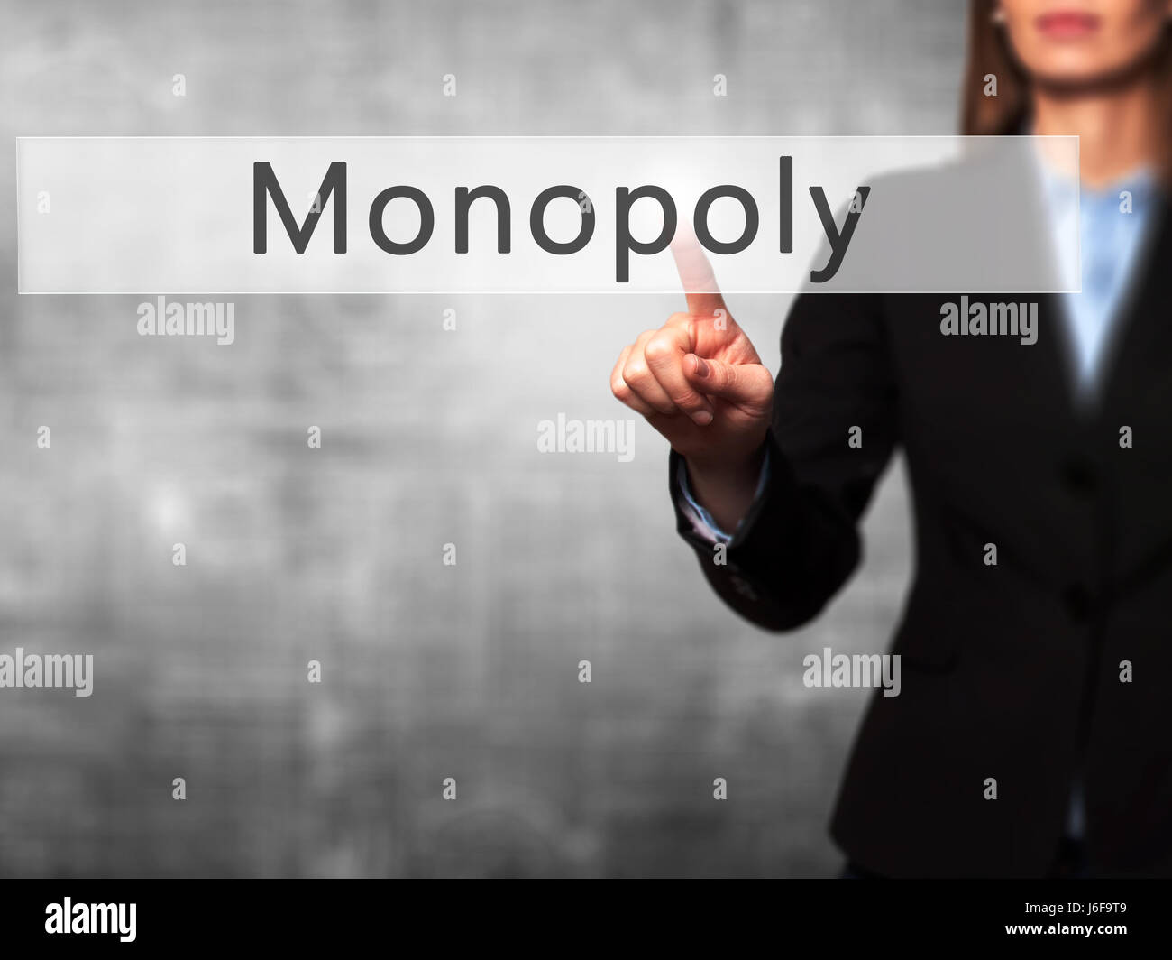 Monopoly - Businesswoman hand pressing button on touch screen interface ...