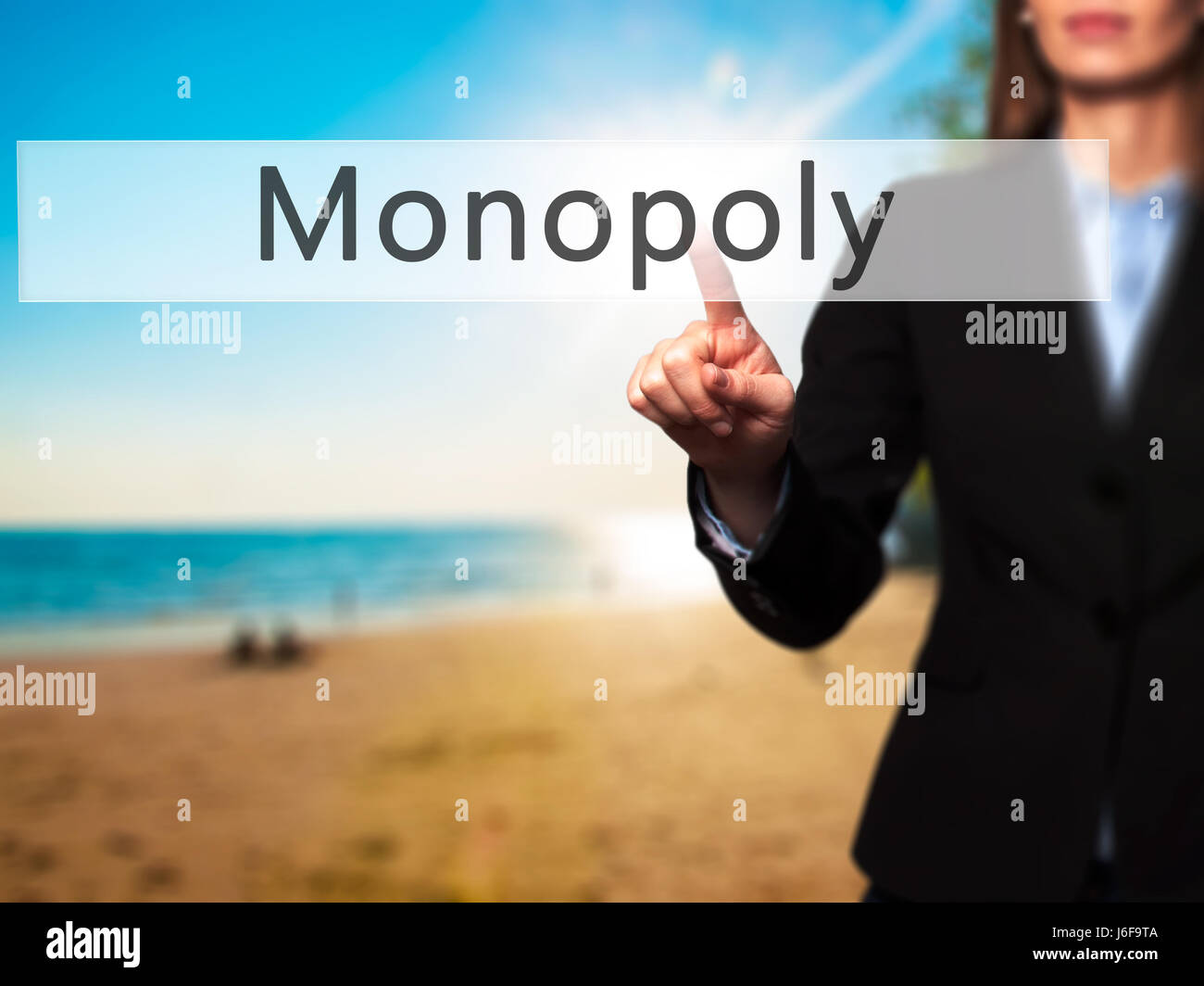 Monopoly - Businesswoman hand pressing button on touch screen interface ...