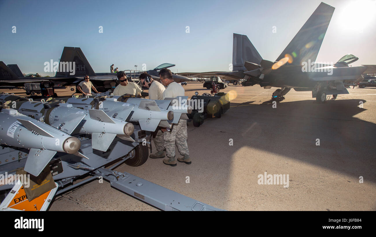 Weapons Airmen from the Hawaii Air National Guard prepare munitions for ...