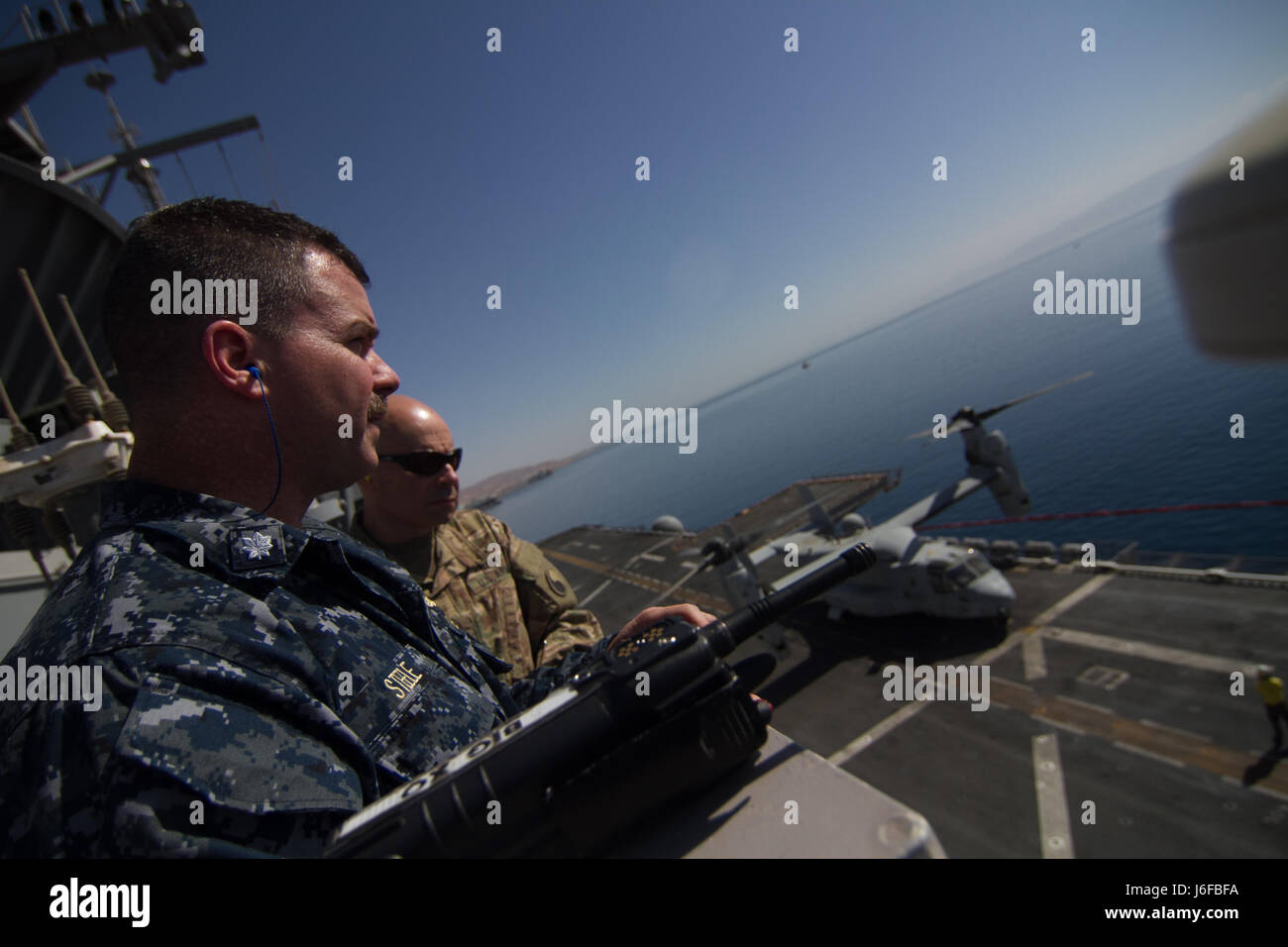 Cmrd. Sylvester Steele explains USS Bataan Air operations with Briga ...