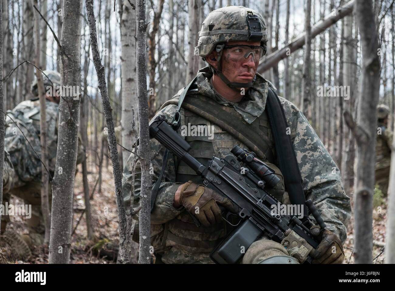 A machine gunner with 6th Brigade Engineer Battalion, 4th Infantry ...