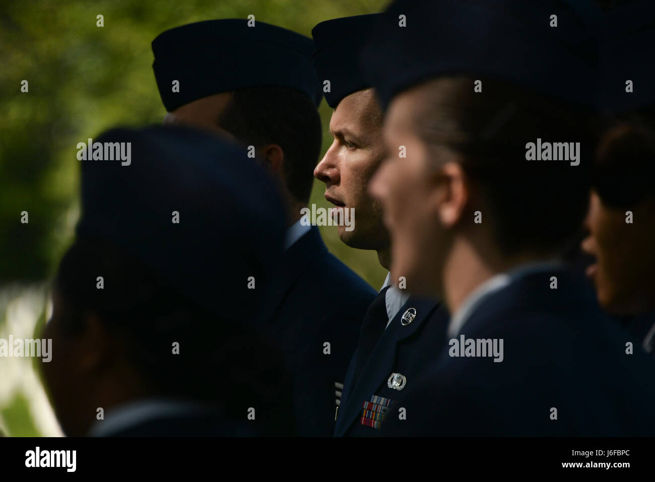 The 94th Intelligence Squadron choir sings the national anthem prior to ...
