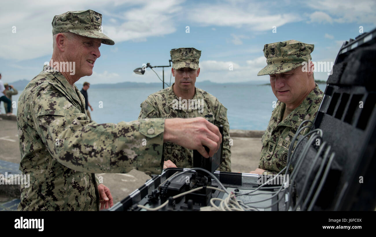 U.S. Navy Capt. Robert Baughman, left, Senior Chief Petty Officer ...