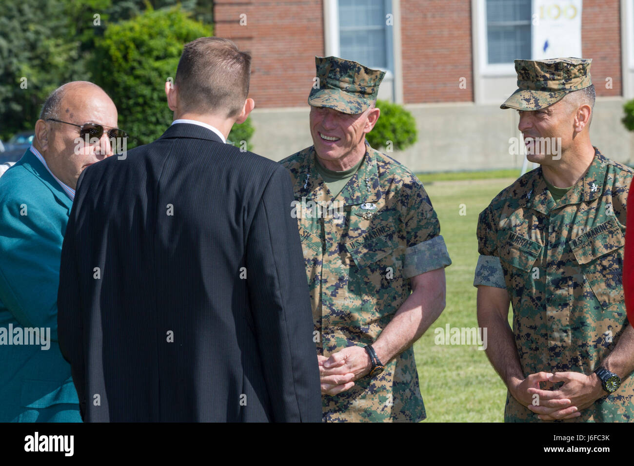 U.S. Marine Corps Lt. Gen. Robert S. Walsh, center, commanding general ...