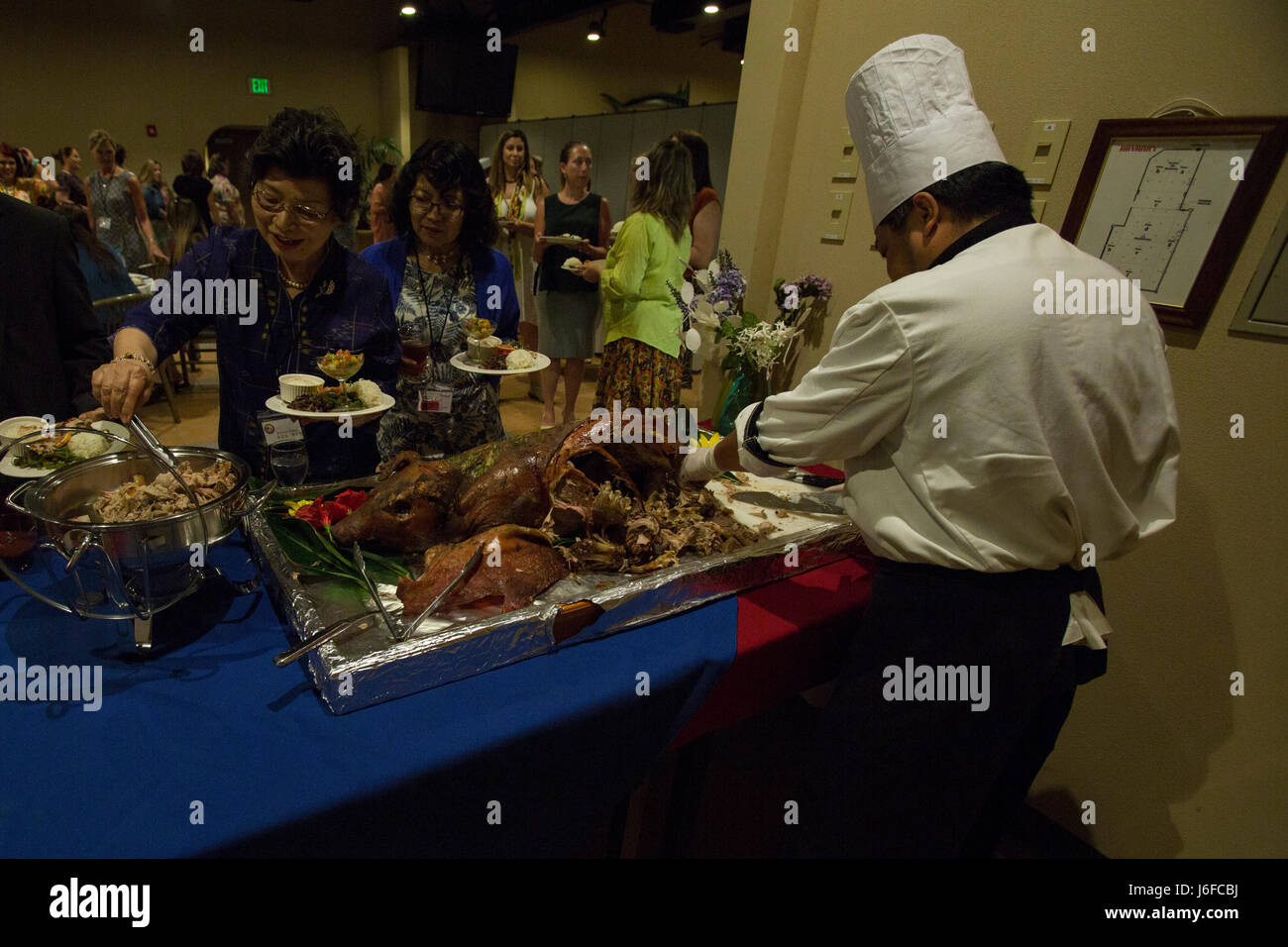 Members of local organizations enjoy a buffet during the American Women ...