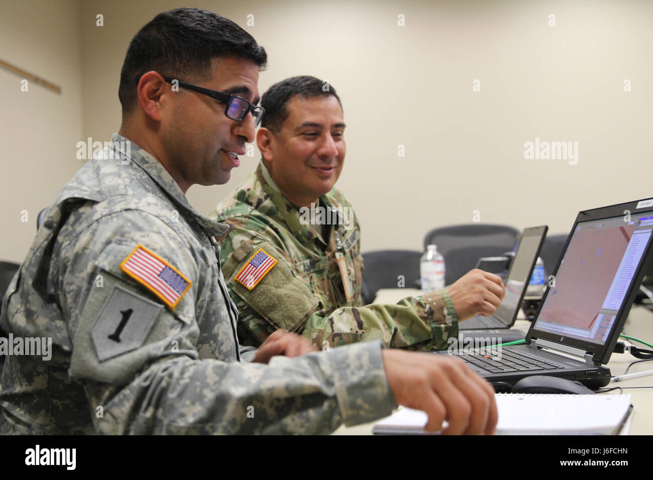 Cpt. John Alban and Spc. Steve Govea with the Colorado Army National Guard provide command and ...