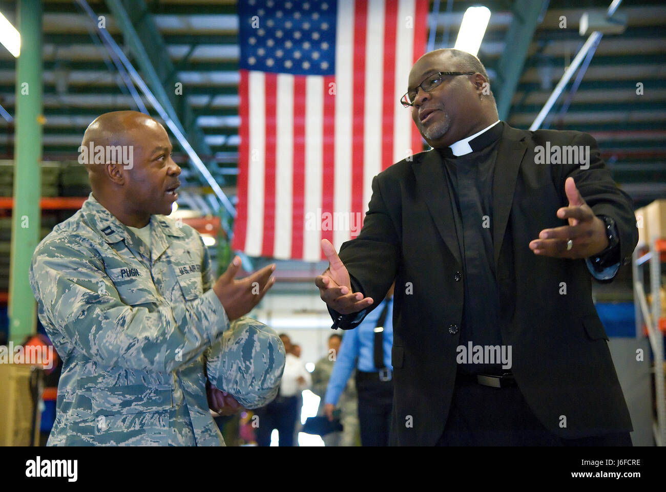 Chaplain (Capt.) Kevin Pugh, 436th Airlift Wing, talks with Reverend ...
