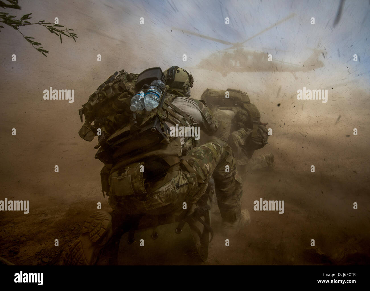 U.S. Air Force pararescuemen with the 58th Rescue Squadron prepare for ...