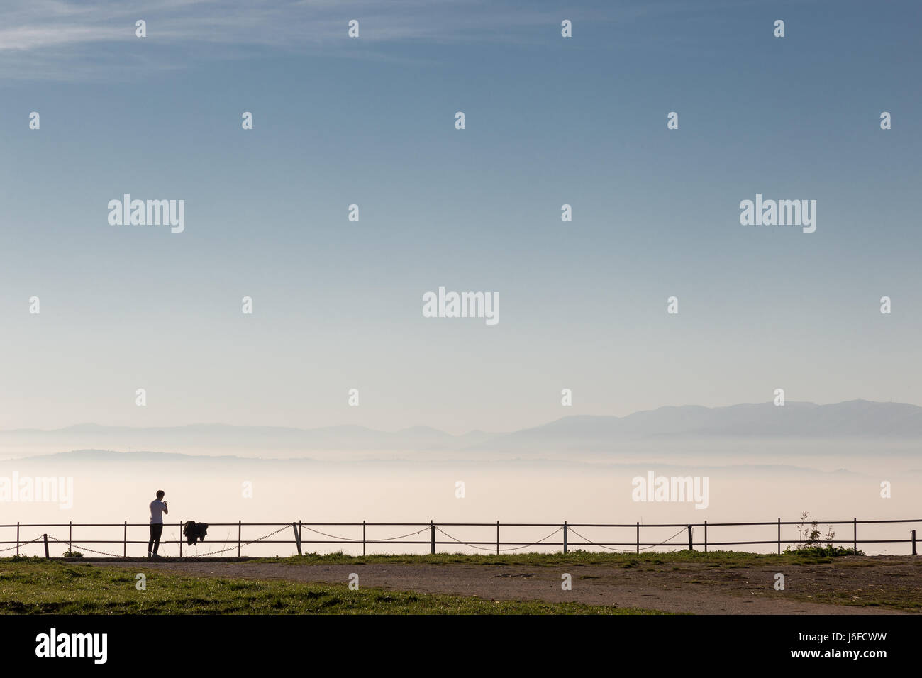 Man above clouds looking hi-res stock photography and images - Alamy