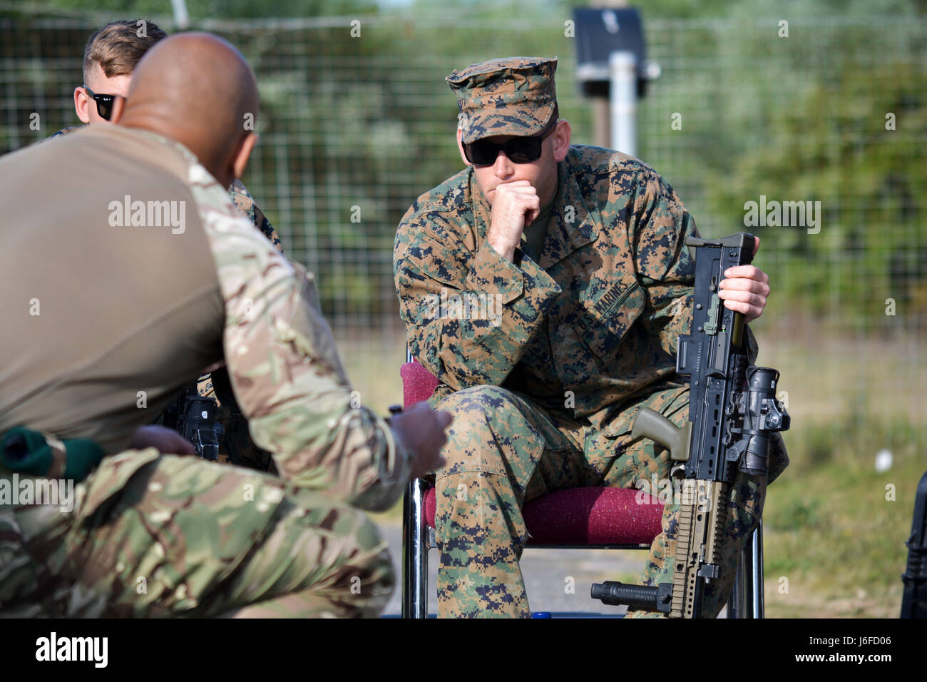 U.S. Marine Corps Sgt. Victor Netta, chief primary marksmanship ...