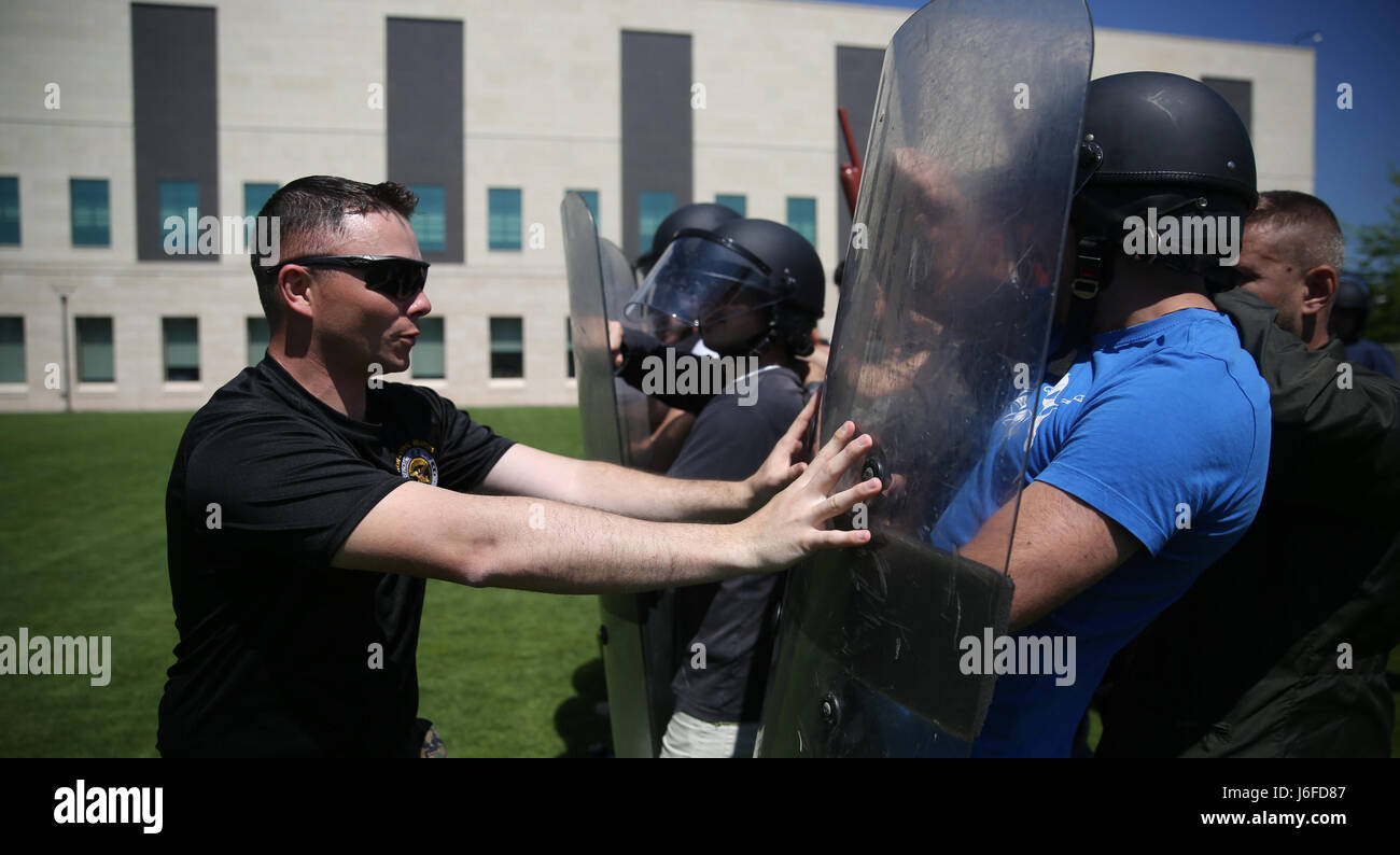 A U.S. Marine with Black Sea Rotational Force 17.1 tests a riot control ...